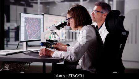 African American Doctor Conducts Research with Computer in Hospital ...