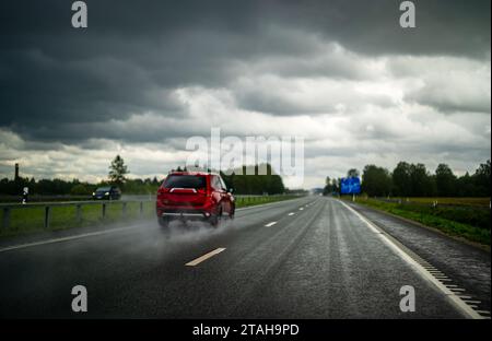Bad road conditions. Rain and worsening weather Stock Photo - Alamy