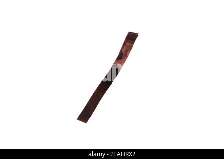 Piece of bronze confetti isolated on white Stock Photo - Alamy
