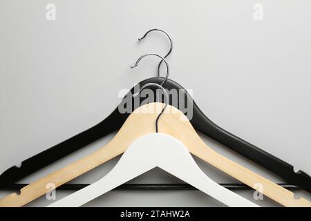 Different hangers on light gray background, top view Stock Photo - Alamy