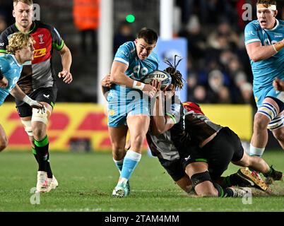Harlequins' Chandler Cunningham-South is tackled by Ulster Rugby's ...