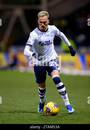 Liam Millar of Preston North End blocks a shot by Greg Docherty of Hull ...