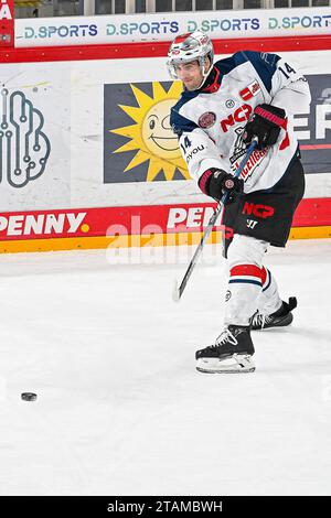 Cole Maier (Nuremberg Ice Tigers, #14) in front of Adam Brooks (EHC Red ...