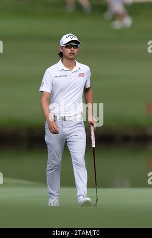 Min Woo Lee, of Australia, walks to the 16th green during the second ...