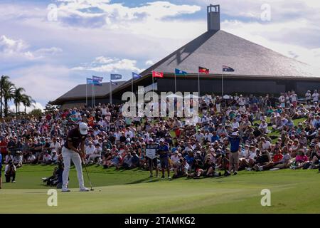 Min Woo Lee, of Australia, putts on the 10th hole during the first ...