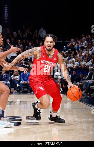 December 6, 2023: Houston guard Emanuel Sharp (21) shoots the ball ...
