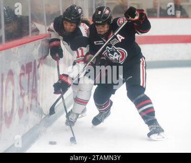 St. Cloud State Huskies defenseman Jack Peart (23) skates with the puck ...