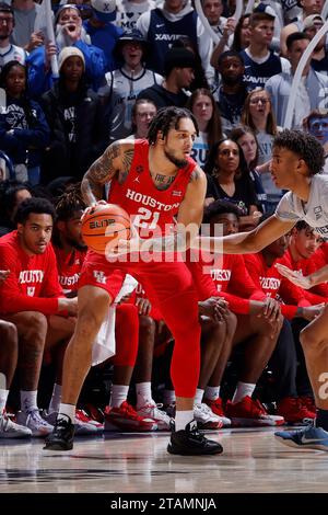 December 6, 2023: Houston guard Emanuel Sharp (21) shoots the ball ...