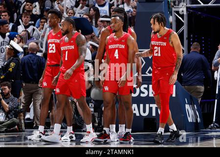 December 6, 2023: Houston guard Emanuel Sharp (21) shoots the ball ...