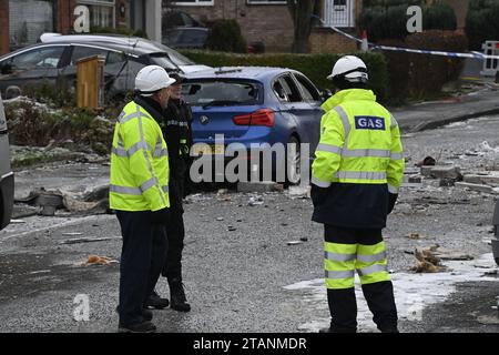 Gas engineers and police officers at the scene on Baberton Mains Avenue ...