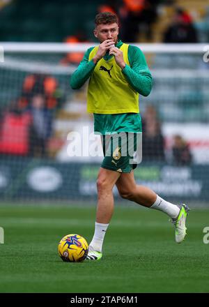 Dan Scarr #6 of Plymouth Argyle warming up during the Sky Bet ...