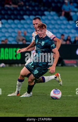 Sydney, Australia. 03rd Dec, 2023. Min Woo Lee of Australia chips on to ...