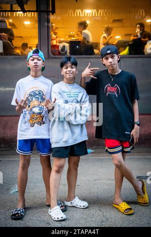 Three young teenage boys strike a pose in Manila, The Philippines Stock Photo - Alamy