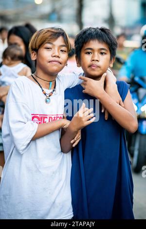 Two young boys strike a pose in Manila, The Philippines Stock Photo - Alamy