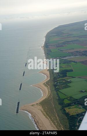 Aerial view of flood protection barrier reefs at Sea Palling, Norfolk ...