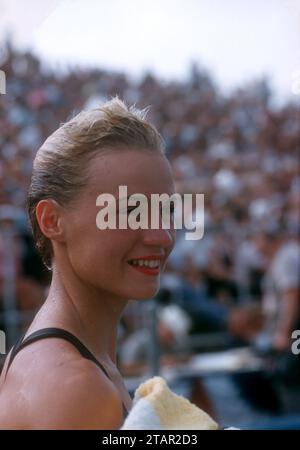 DETROIT, MI - AUGUST, 1956: American diver Jerry Harrison goes into his ...