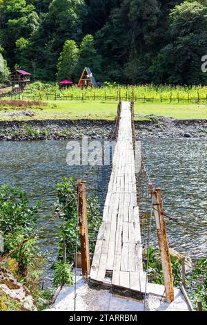 travel to Georgia - wood flooring of suspension bridge over Machakhela ...