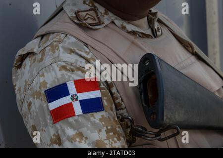 The Dominican flag on a soldier's uniform in Dajabón, Dominican ...