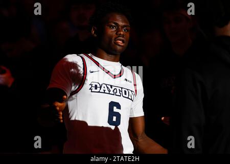 Dayton, USA. 02nd Dec, 2023. Enoch Cheeks (6) moves the ball up court ...
