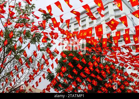 Flags of Vietnam and Communist flags with a hammer and sickle on the ...