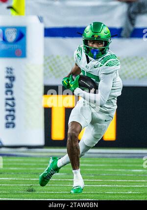 Oregon wide receiver Tez Johnson runs the 40-yard dash at the NFL ...