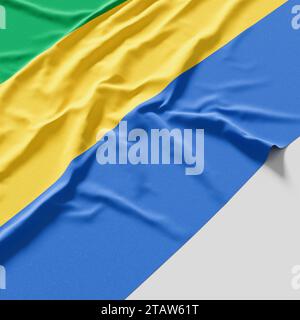 Flag of Gabon. Fabric textured Gabon flag isolated on white background ...