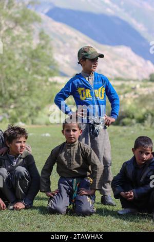 Happy Afghan children in need, looking at the camera and smiling Stock ...