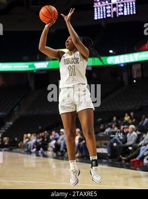 November 30, 2023: Wake Forest freshman Kate Deeble (12) drives to the ...