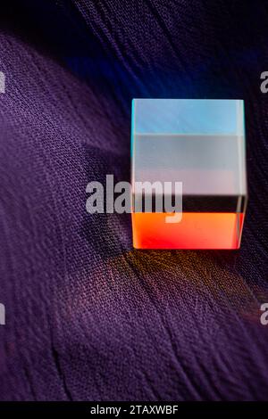 Luminous prism cubes refract light in different colors Stock Photo - Alamy