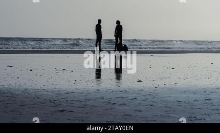 Oman,salalah- November 01,2023- shadow of couple at a beach Stock Photo ...
