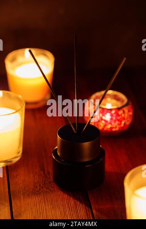 Concept of table setting with aroma candles Stock Photo - Alamy