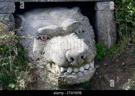 Roy Dog carving by Damien Briggs, a legendary giant beast with red and ...