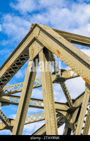 Grey iron beams and trusses forming part of the structure of a railroad ...