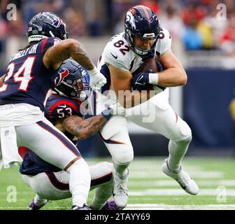 Denver Broncos tight end Adam Trautman (82) reacts against the Las ...