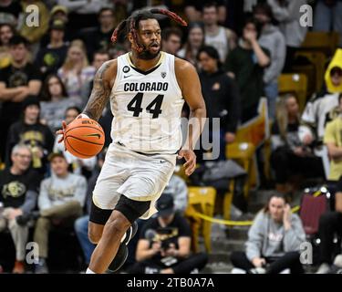 Colorado center Eddie Lampkin Jr. drives past Oregon State forward ...