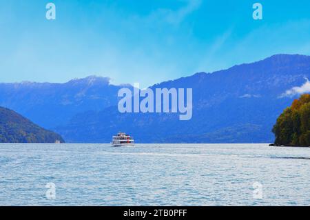 white touring boat in Interlaken lake Stock Photo - Alamy