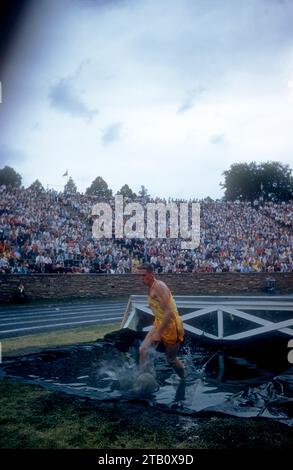 BOULDER, CO - JUNE 25: College athletes participate in the steeplechase ...