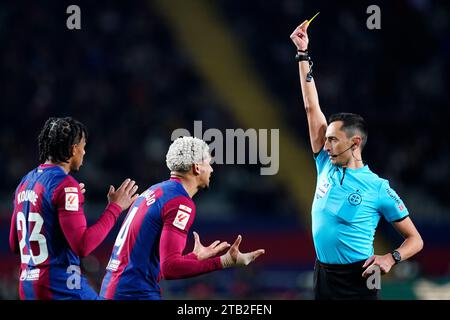 BARCELONA - DEC 1: The referee shows a yellow card to Victor Sanchez at ...