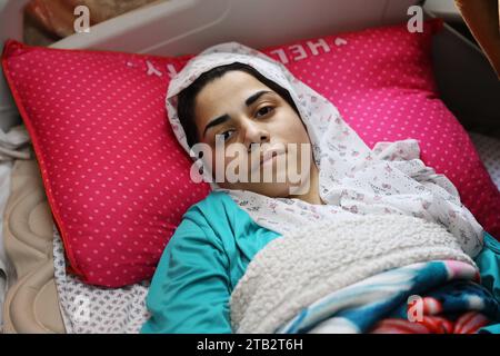 Palestinian Samah Mohsen, sitting with her mother and sister in Al-Aqsa ...