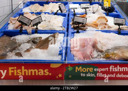 Fishmonger counter at a supermarket Stock Photo - Alamy