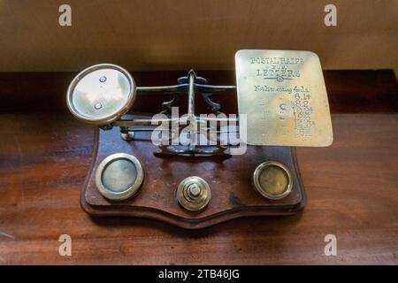 A set of brass 18th century postal scales, used to weigh letters to ...