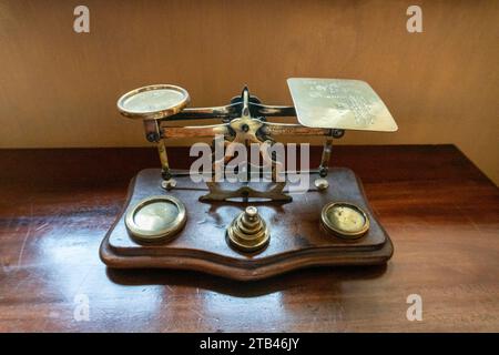 A set of brass 18th century postal scales, used to weigh letters to ...