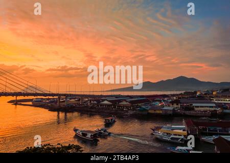 Manado port & Soekarno Bridge at sunset in the provincial capital of ...
