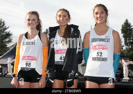 Girls winner Irene Riggs (center) poses with runner-up Brooke WIlson ...