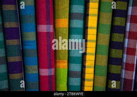 Multicolor Traditional Bangladeshi men's wear lungi folded on a rack in ...