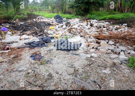 Rubbish on the ground. Illegally throwing garbage Stock Photo - Alamy