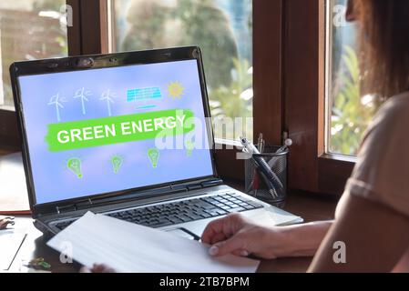 Laptop screen displaying a green energy concept Stock Photo - Alamy