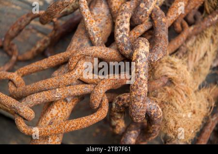 Rusted chains and weathered textures Stock Photo - Alamy