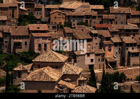Tight-packed traditional houses with pantile roofs and tiled chimney ...