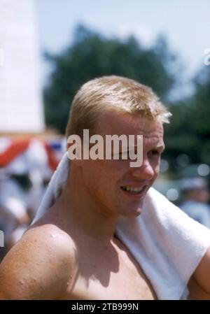 DETROIT, MI - AUGUST, 1956: American diver Jerry Harrison goes into his ...